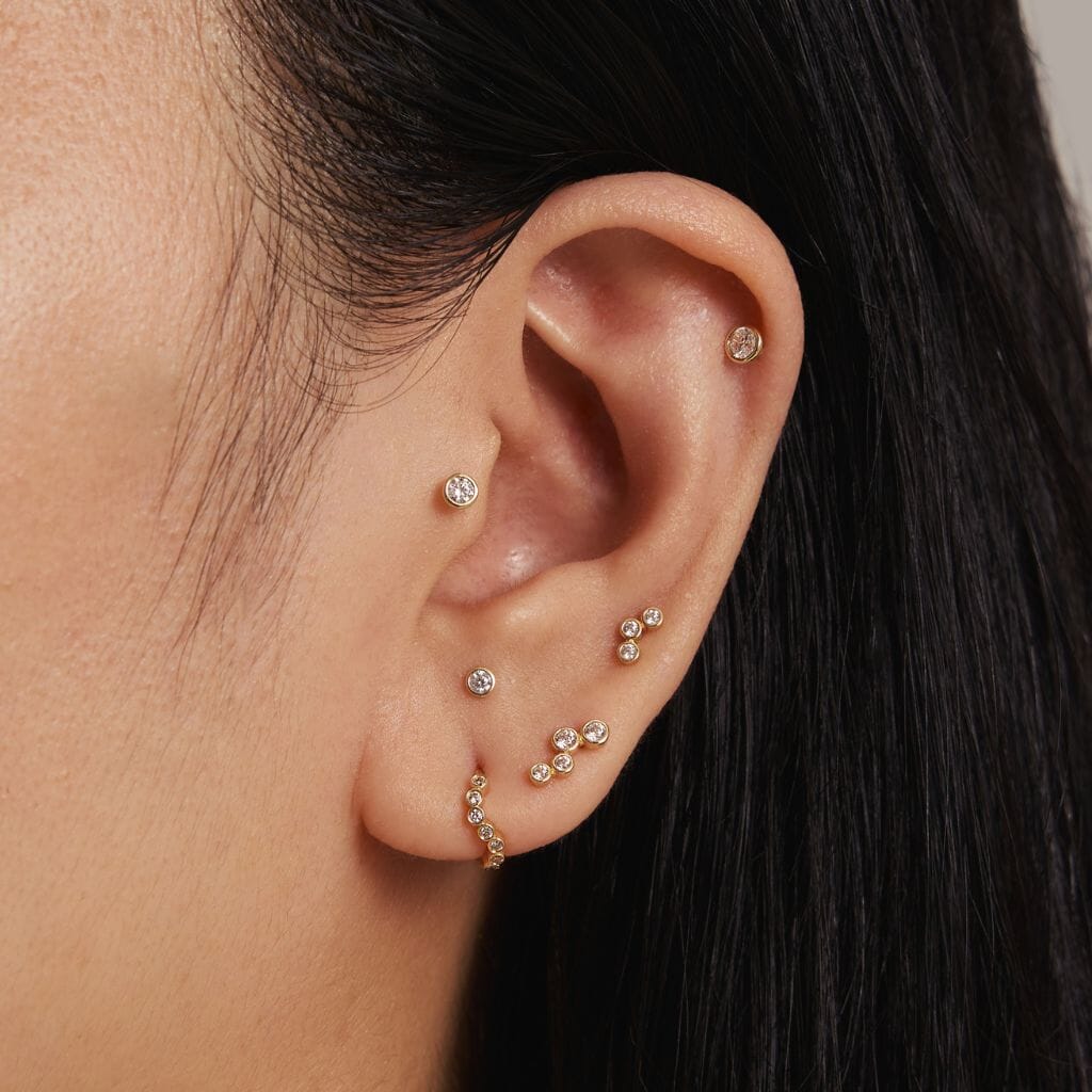 Gold Dent Diamond Piercing | Fine Piercings | Adornmonde